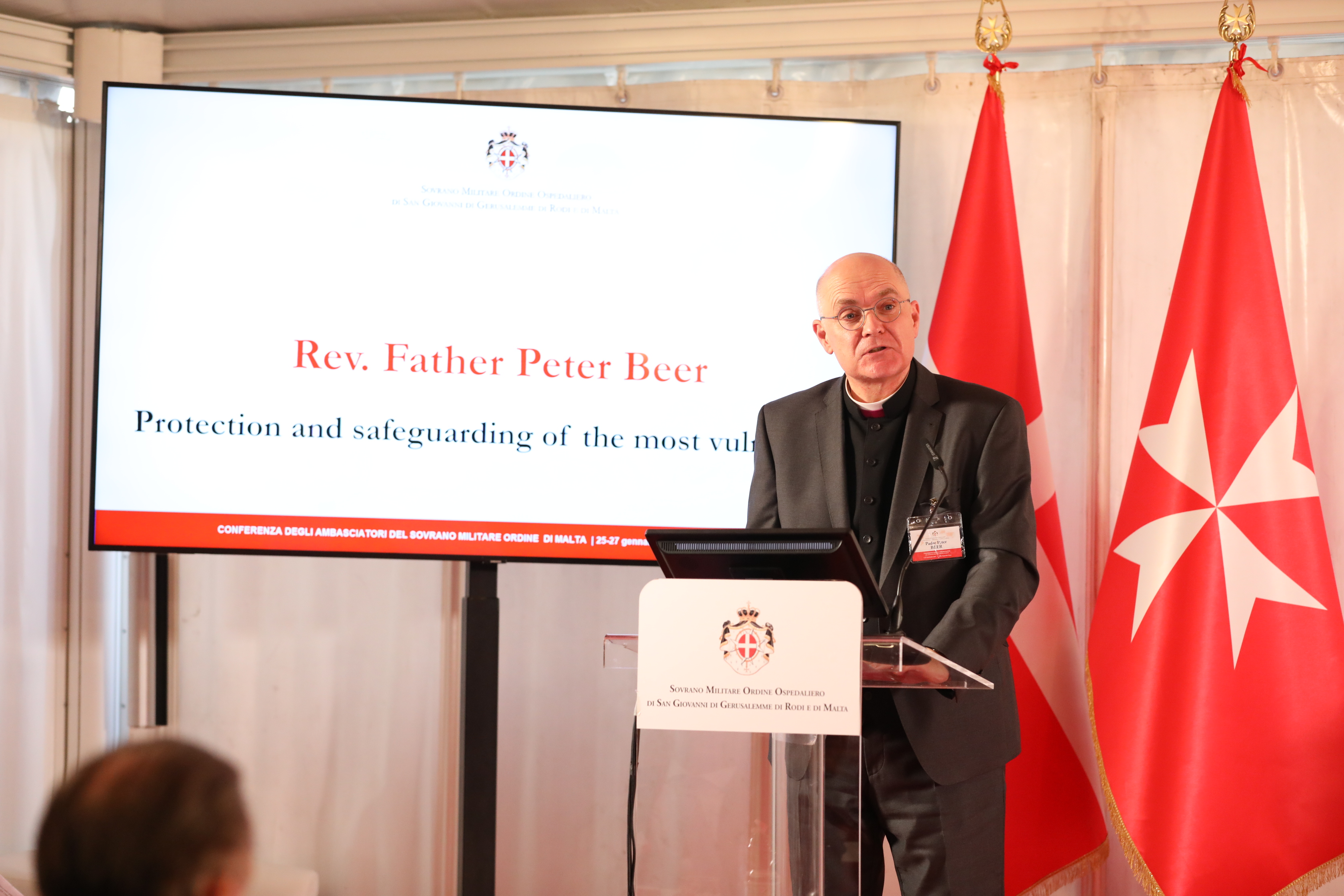 Msgr. Peter Beer addresses Knights of Malta ambassadors